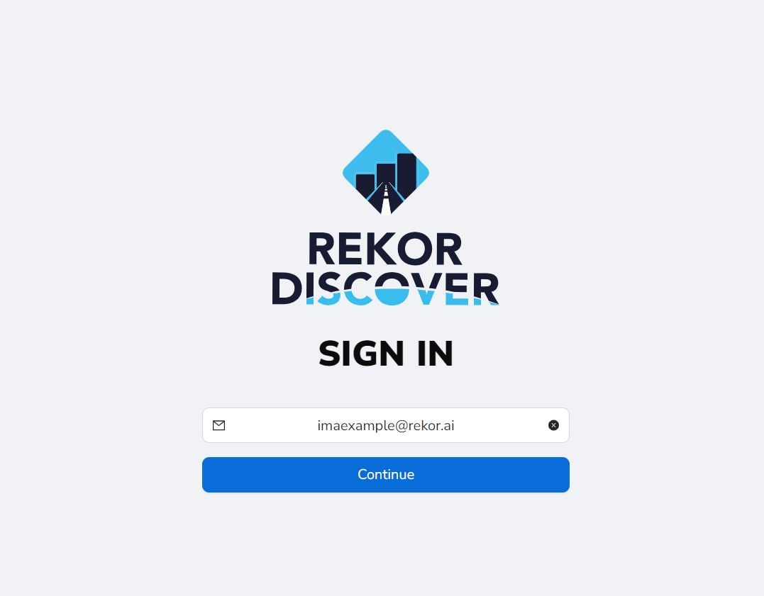 How do I log in to Rekor Discover™?